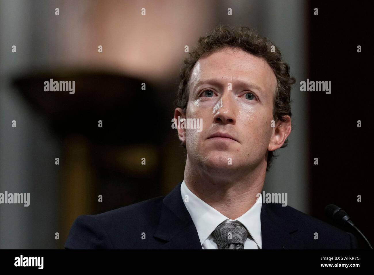 Meta CEO Mark Zuckerberg listens during a Senate Judiciary Committee ...