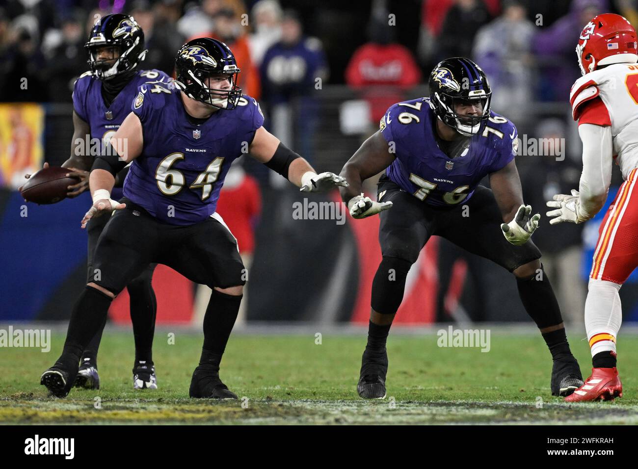 Baltimore Ravens center Tyler Linderbaum (64) and guard John Simpson ...