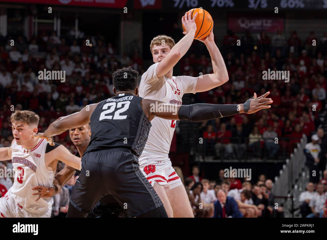 Wisconsin Badgers center Steven Crowl (22) handles the ball during a ...