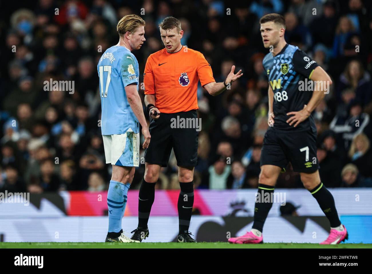 Kevin De Bruyne of Manchester City talks with referee Samuel Barrott ...
