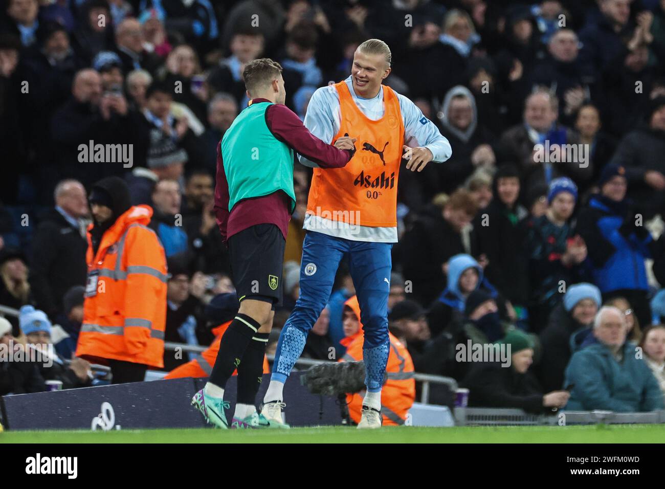 Jacob Bruun Larsen of Burnley and Erling Håland of Manchester City embrace during the Premier ...