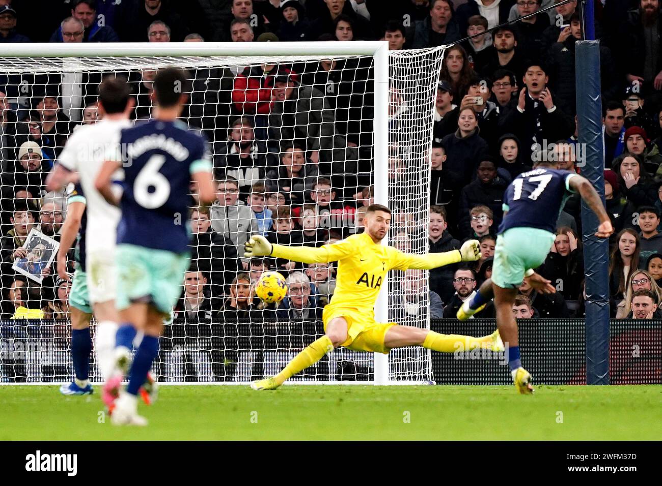 Tottenham Hotspur goalkeeper Guglielmo Vicario is unable to stop ...