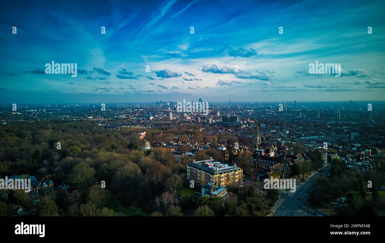Aerial view of a city London skyline with lush greenery under a vibrant ...