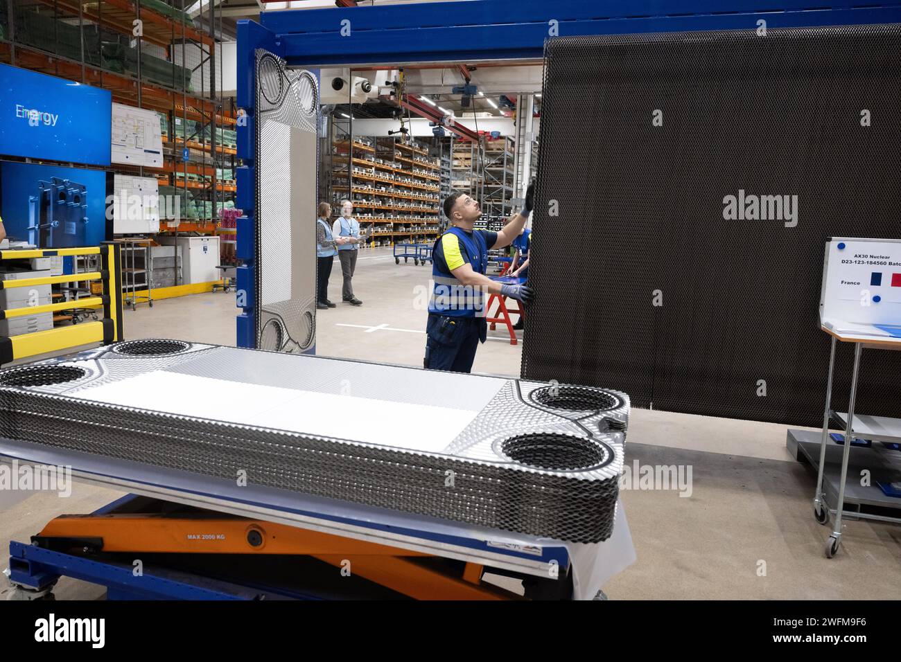 Employee at the industrial site of Swedish heavy industry producer Alfa ...
