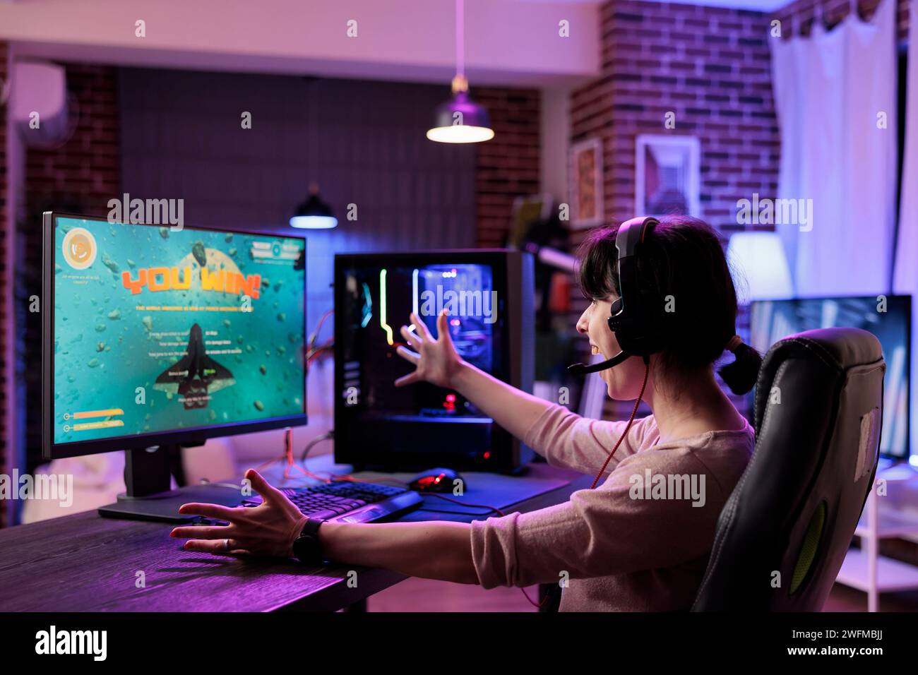 Gamer girl ecstatic about winning singleplayer flying game mission ...