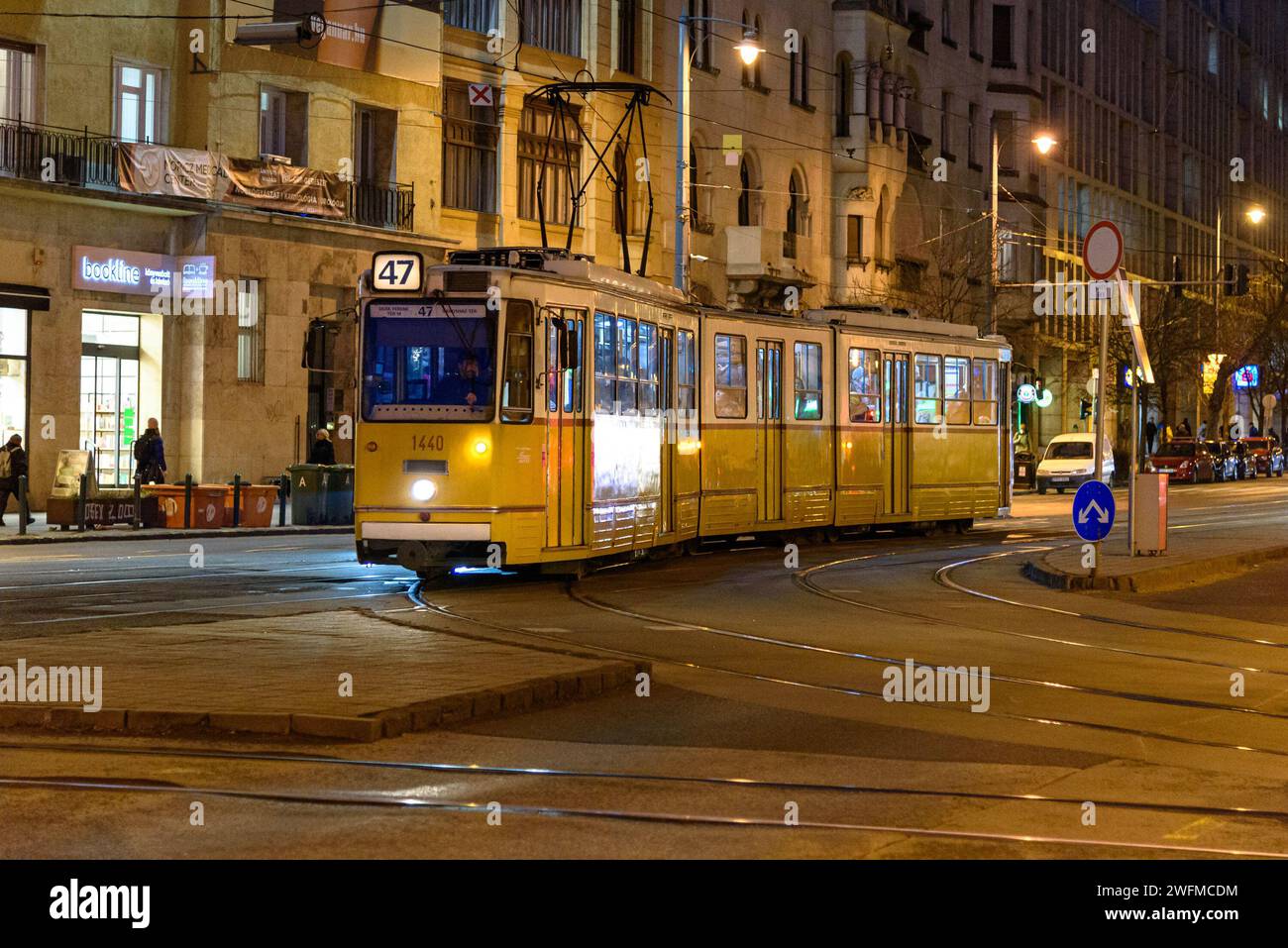 A Ganz CSMG tram on line 47 at Moricz Zsigmond Korter in Budapest at night in winter Stock Photo ...
