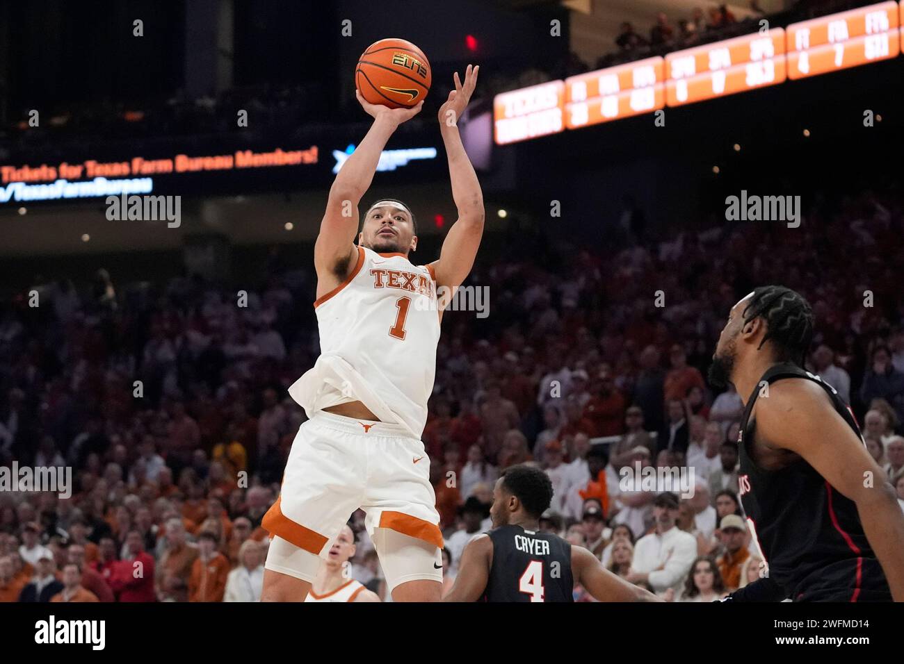 Texas forward Dylan Disu (1) shoots against Houston during the second ...