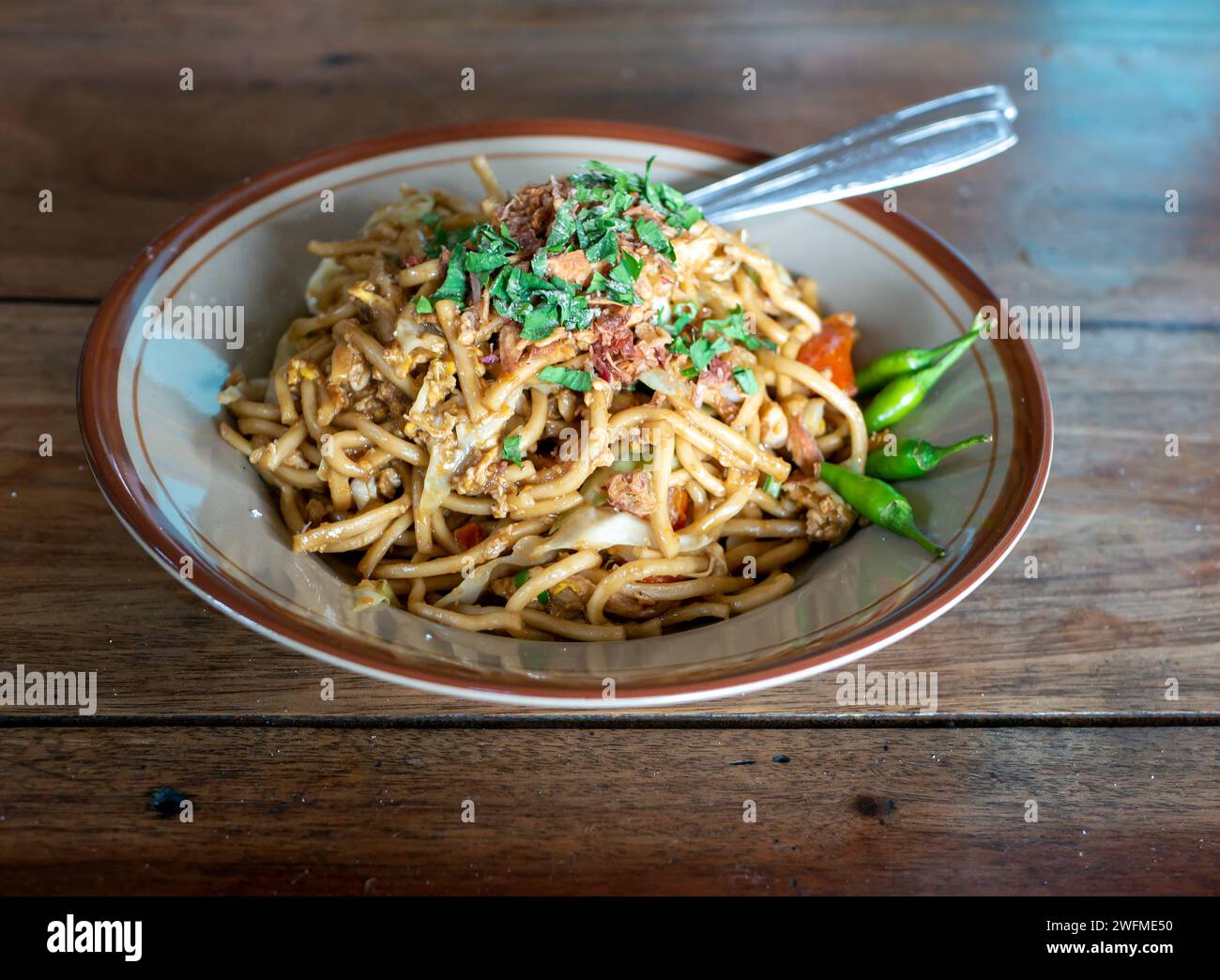 Bakmi Goreng, Indonesian traditional street food, fried noodles cooked ...