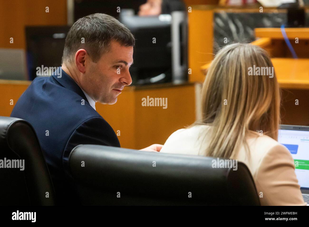 Assistant Oakland County Prosecutor Marc Keast, left, speaks with ...