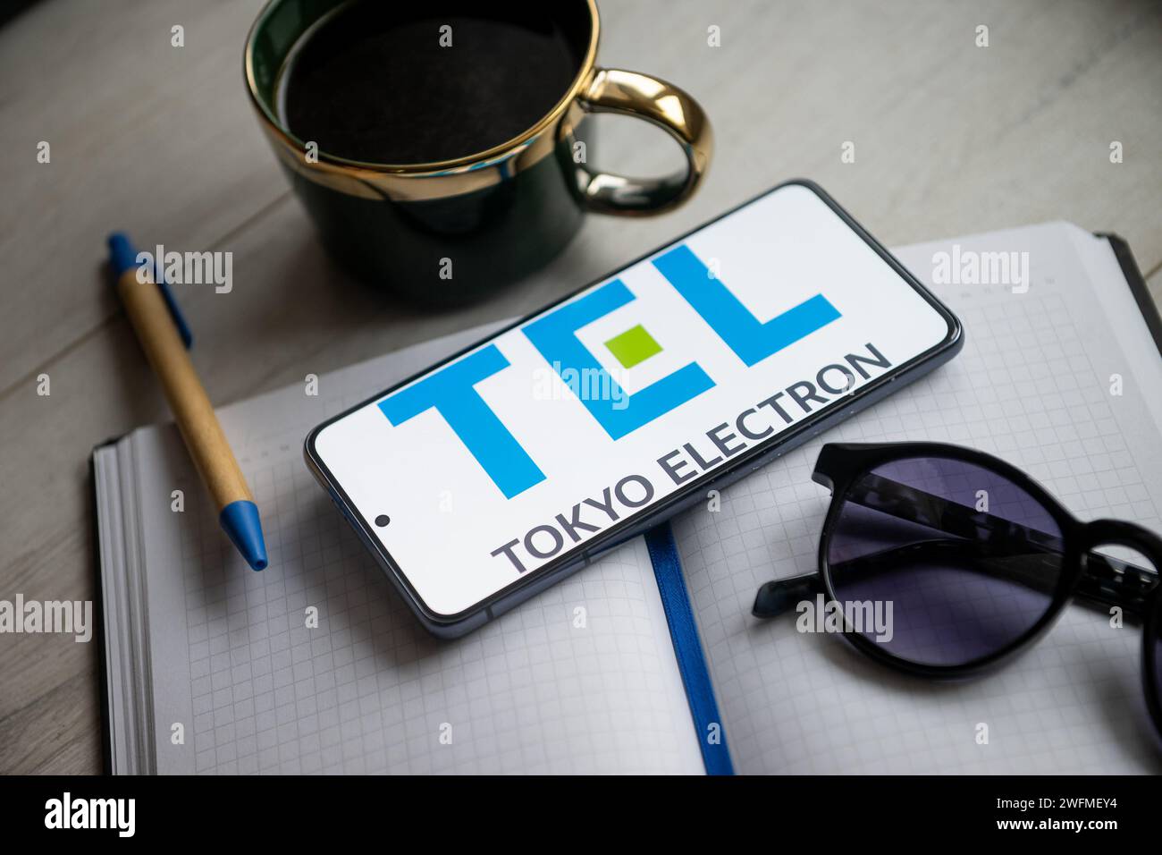 In this photo illustration a Tokyo Electron logo seen displayed on a ...