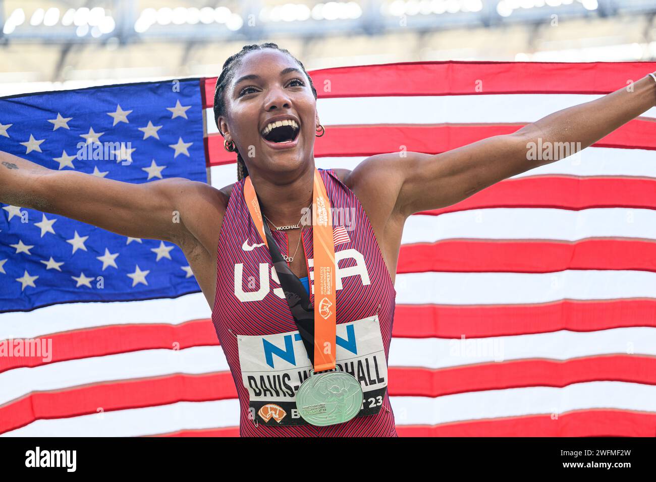 Tara Davis celebrating his medal with the flag in the Budapest 2023 ...