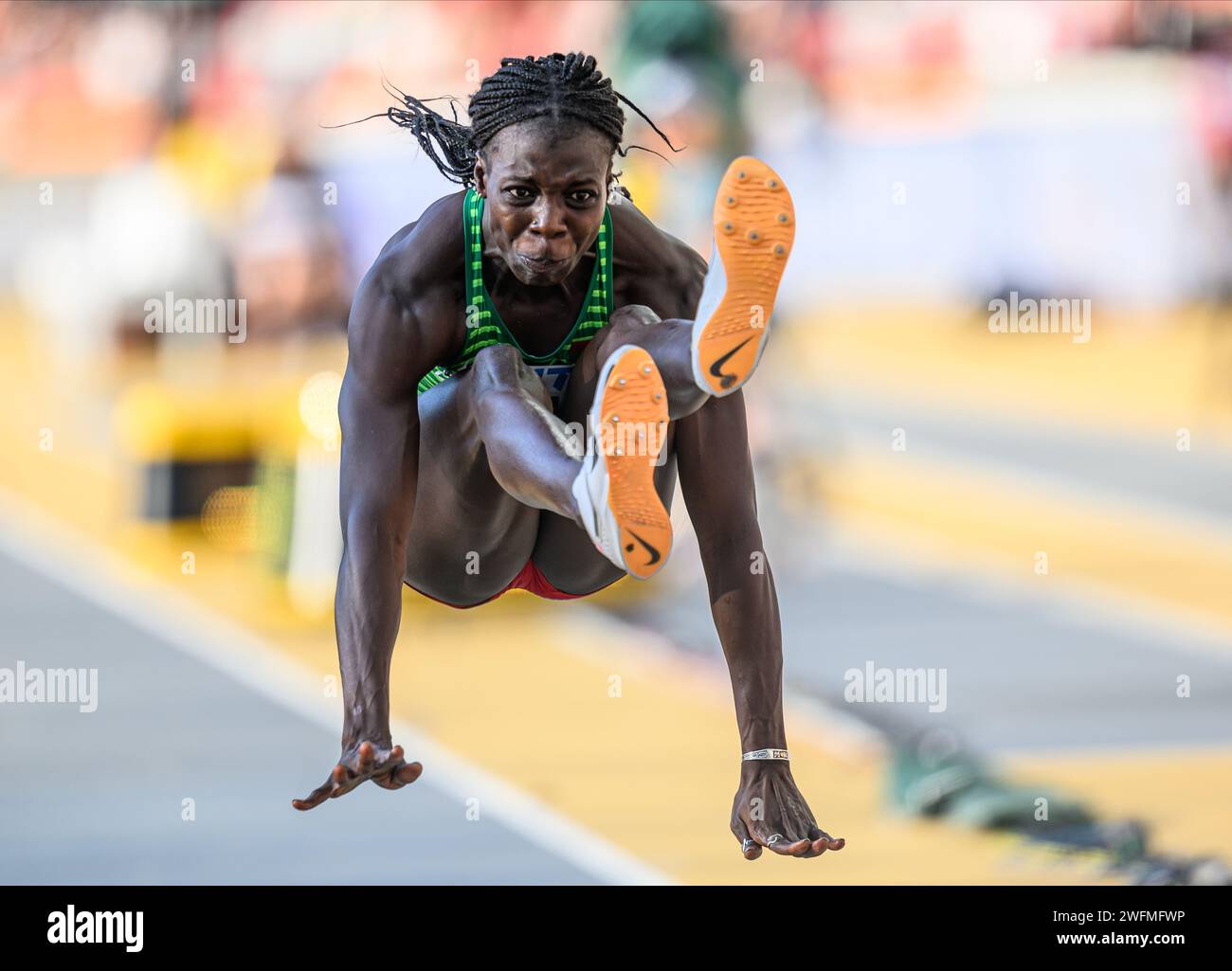 Marthe KOALA participating in the long jump at the World Athletics ...