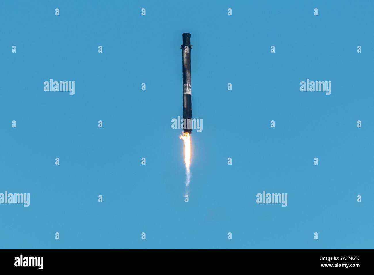 A Falcon 9 booster lands at Launch Zone 1 at Cape Canaveral Space Force ...