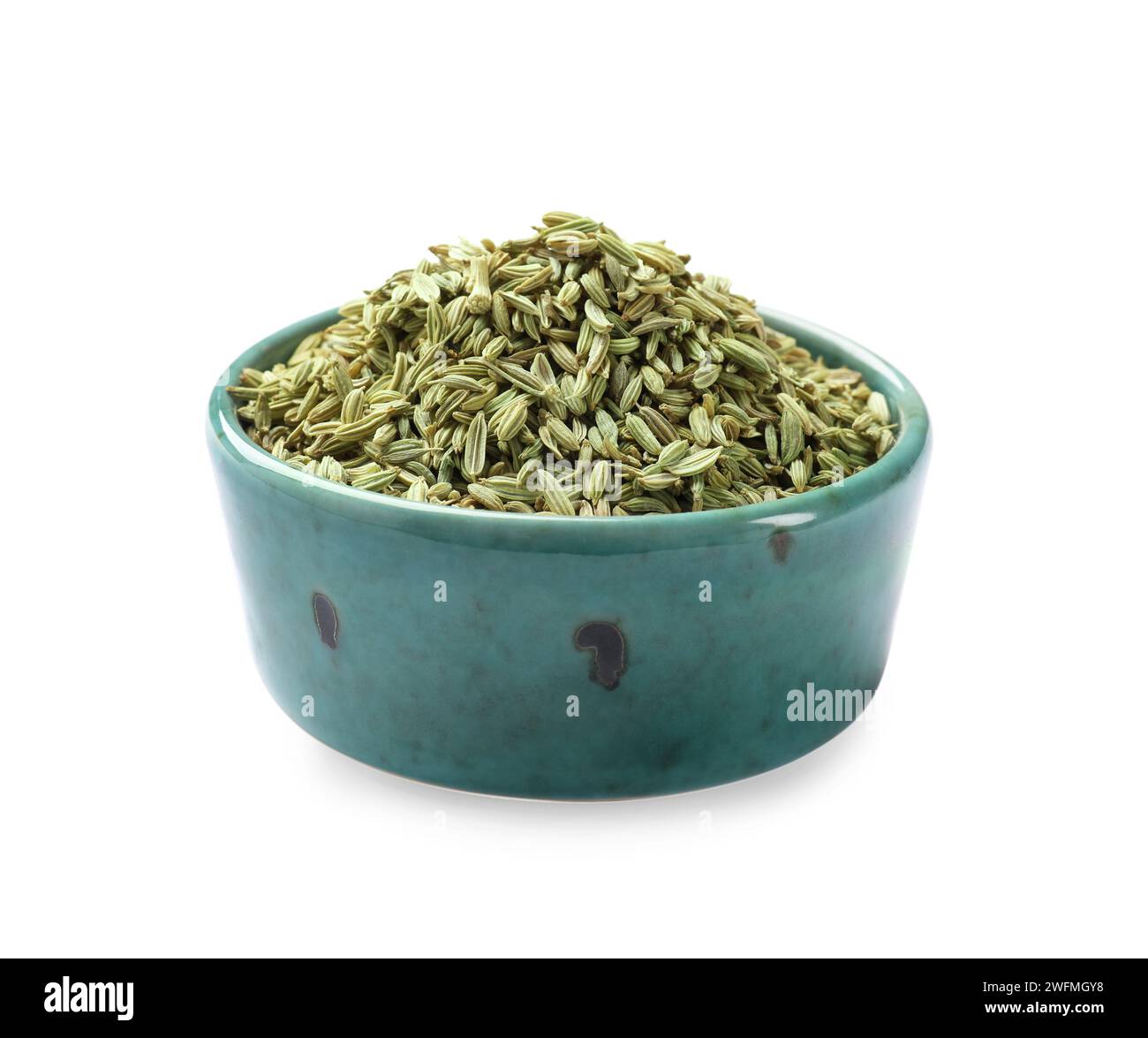 Dried fennel seeds in bowl Cut Out Stock Images & Pictures - Alamy