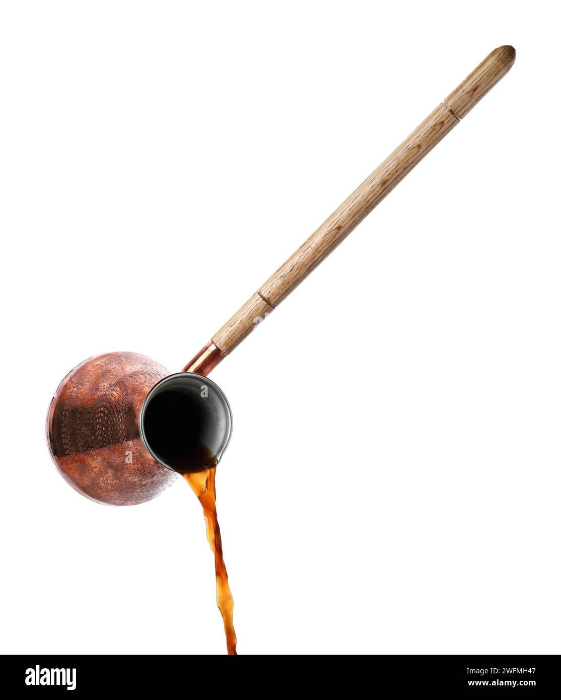 Turkish coffee. Pouring brewed beverage from cezve on white background ...