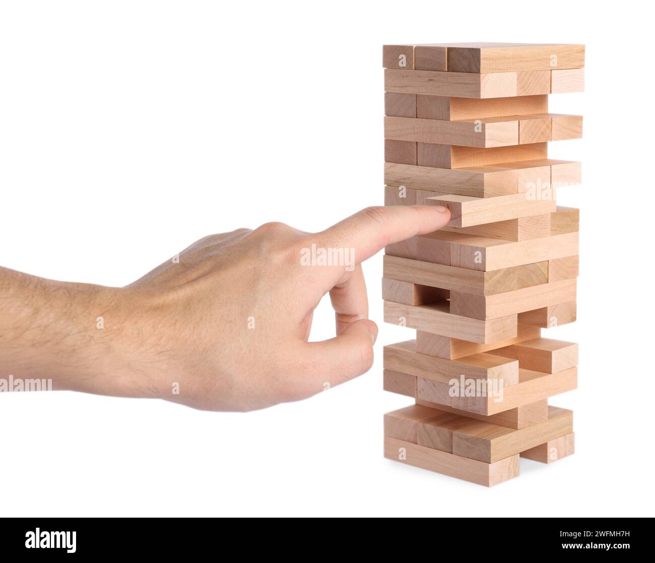 Man playing jenga wooden block Cut Out Stock Images & Pictures - Alamy