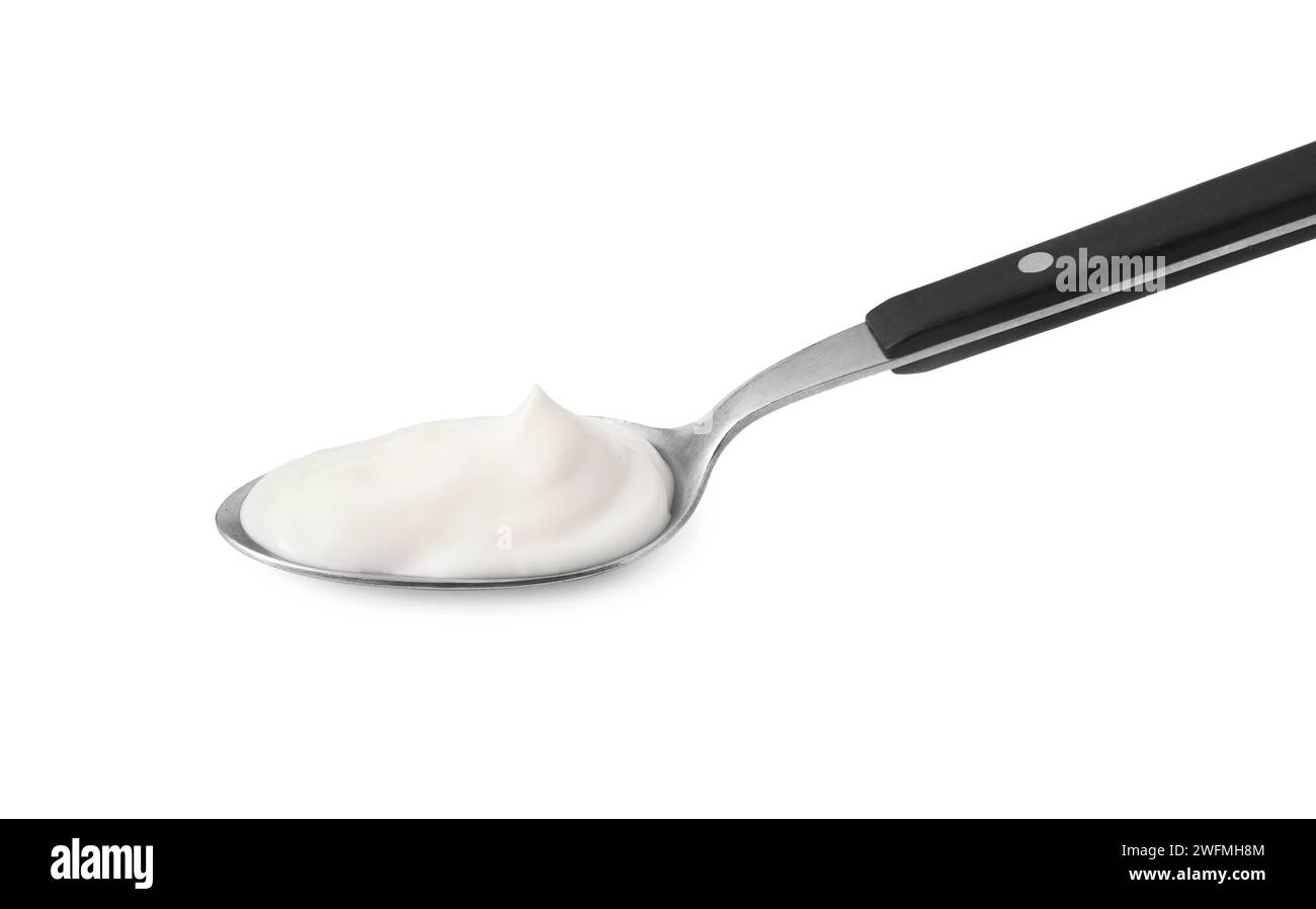 One spoon with mayonnaise isolated on white Stock Photo - Alamy