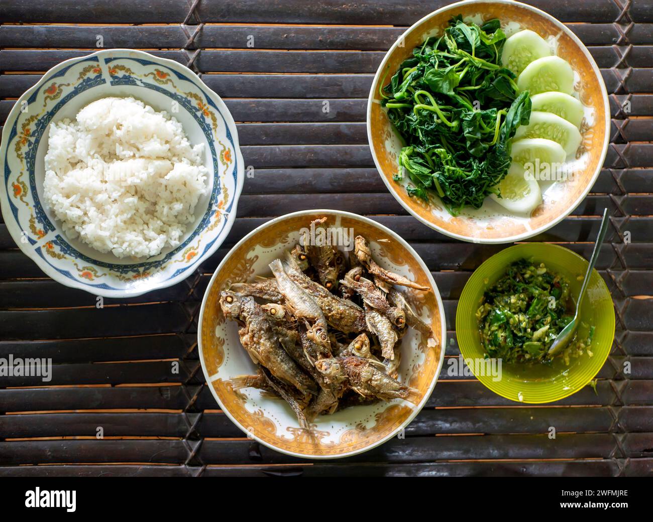 Fried fish with rice and vegetables on, ndonesian cuisine, Indonesian ...