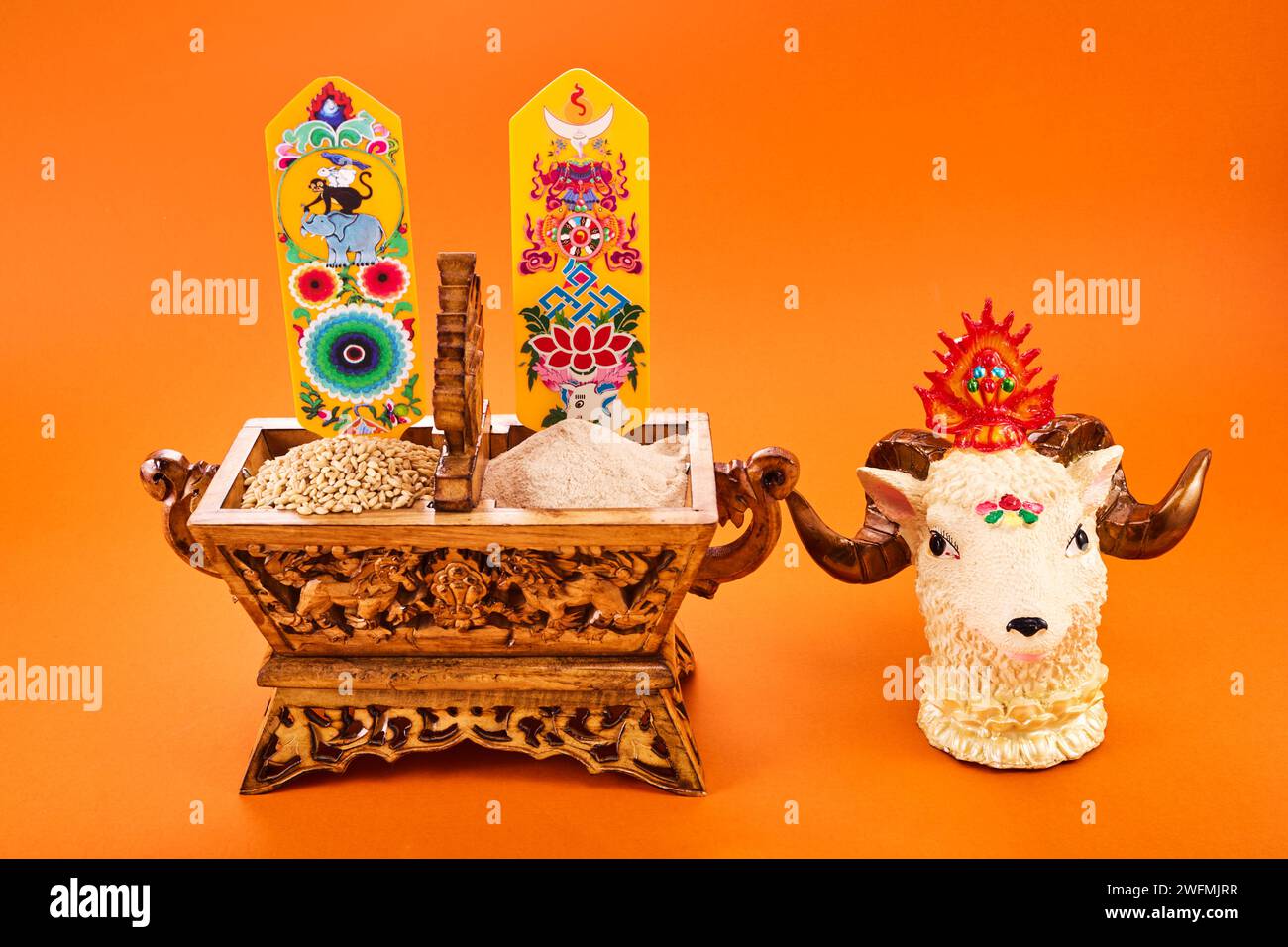 Losar Tibetan New Year. A Chemar box for Tibetan New Year with roasted barley and barley flour ...