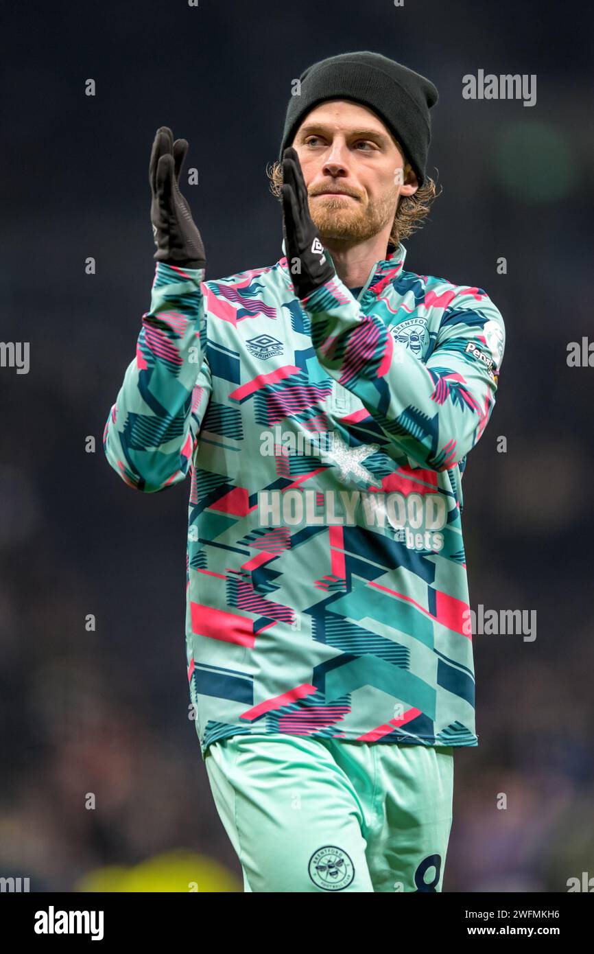 Mathias Jensen of Brentford FC warms up before the Premier League match ...