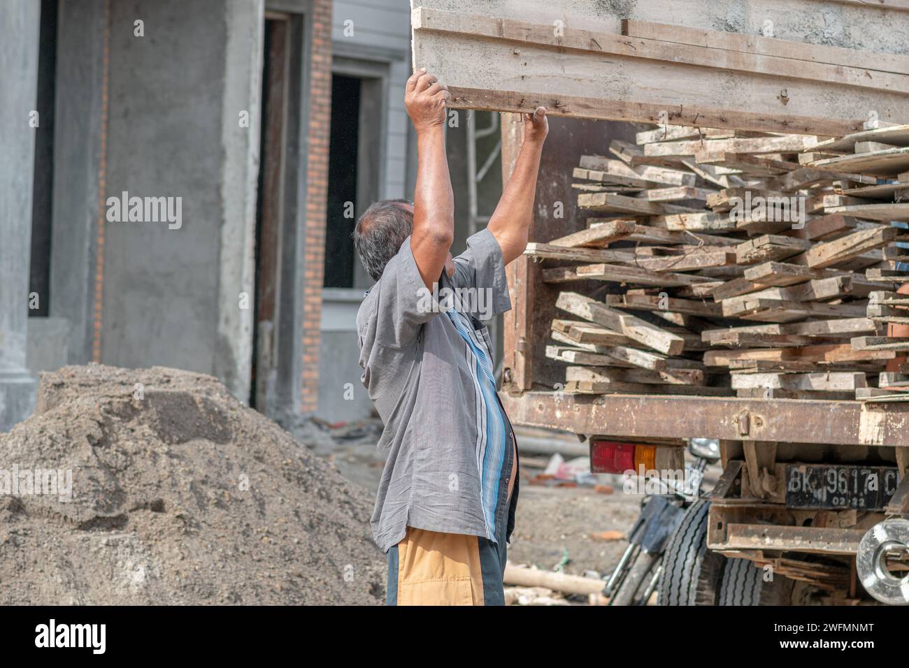 Asian construction workers doing their works in the morning. Building ...