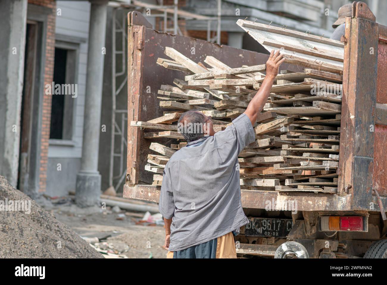 Asian construction workers doing their works in the morning. Building ...
