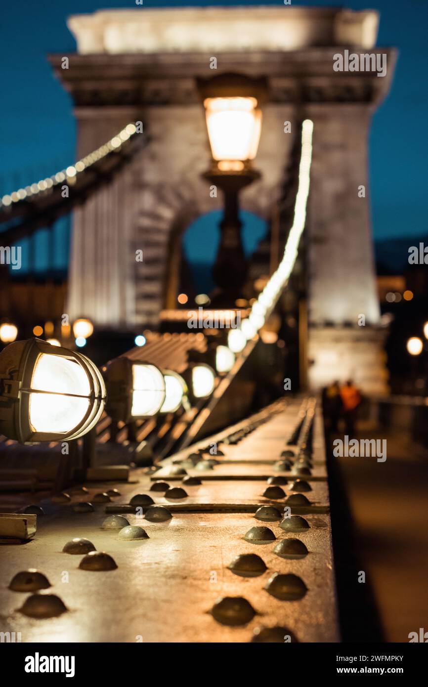 Selective focus photo of Széchenyi Chain Bridge at night. close-up view ...