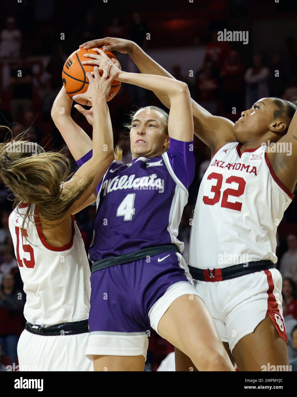 Kansas State Serena Sundell (4) fights for the rebound with Oklahoma ...