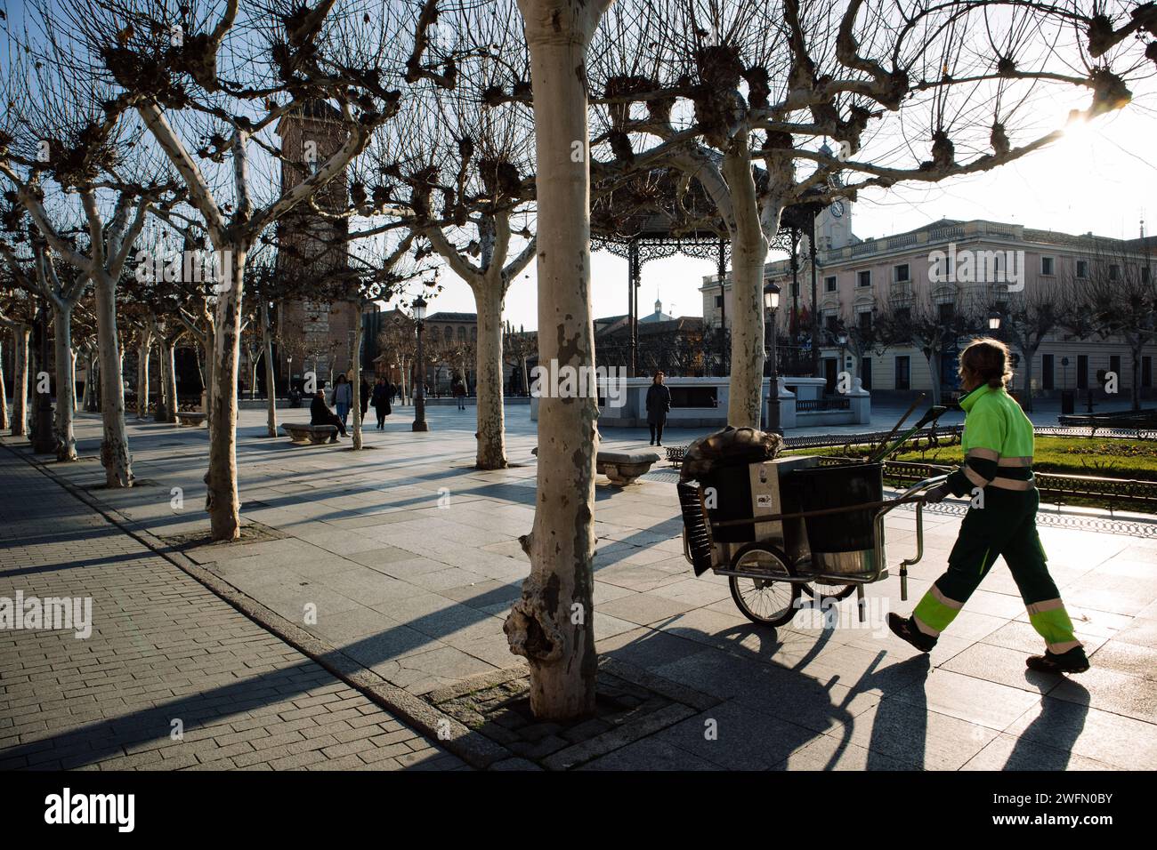 Madrid, Spain. 30 January 2024. City street cleaner in green uniform ...