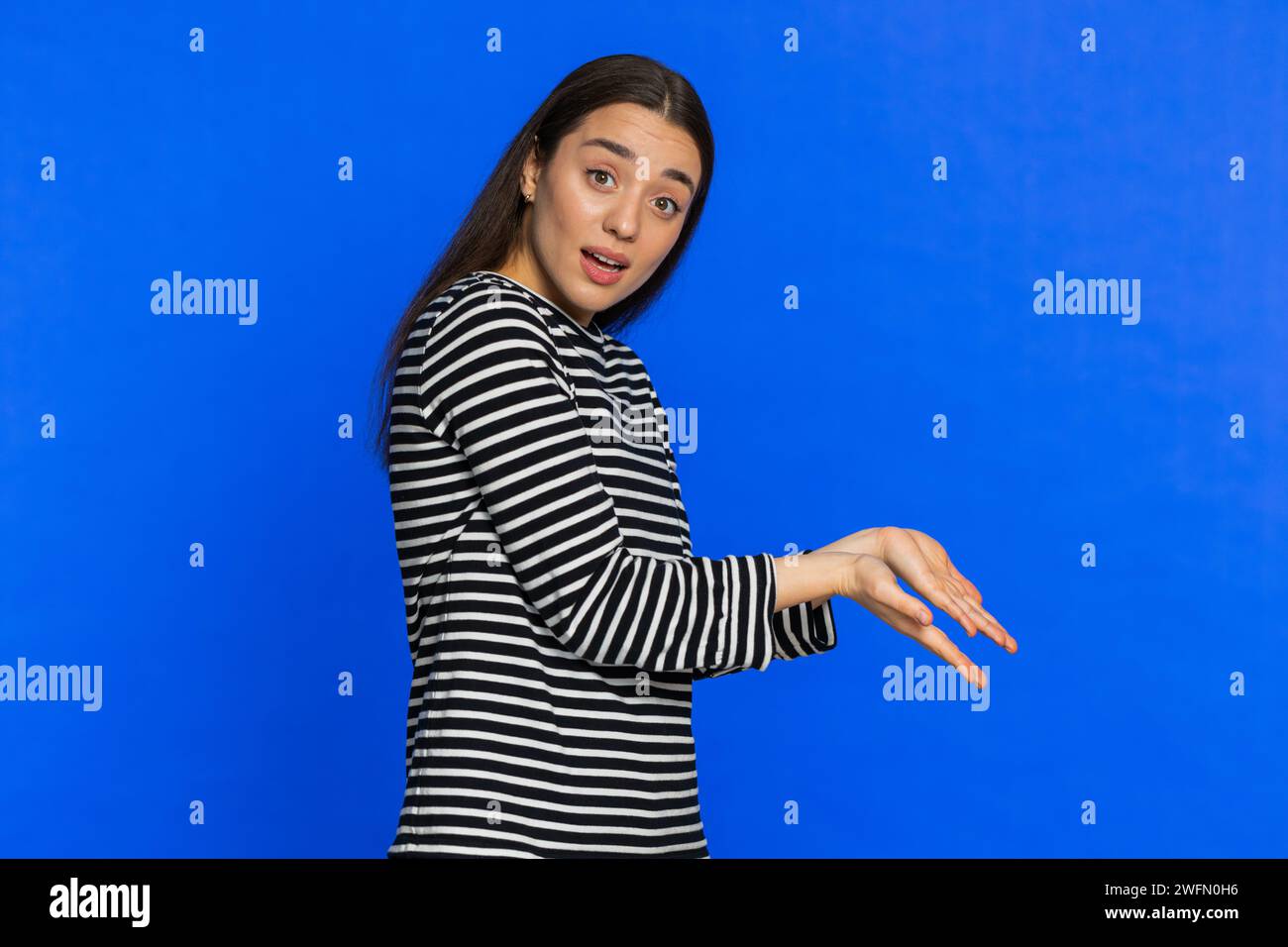Woman raising hands asking what why reason of failure, demonstrating ...