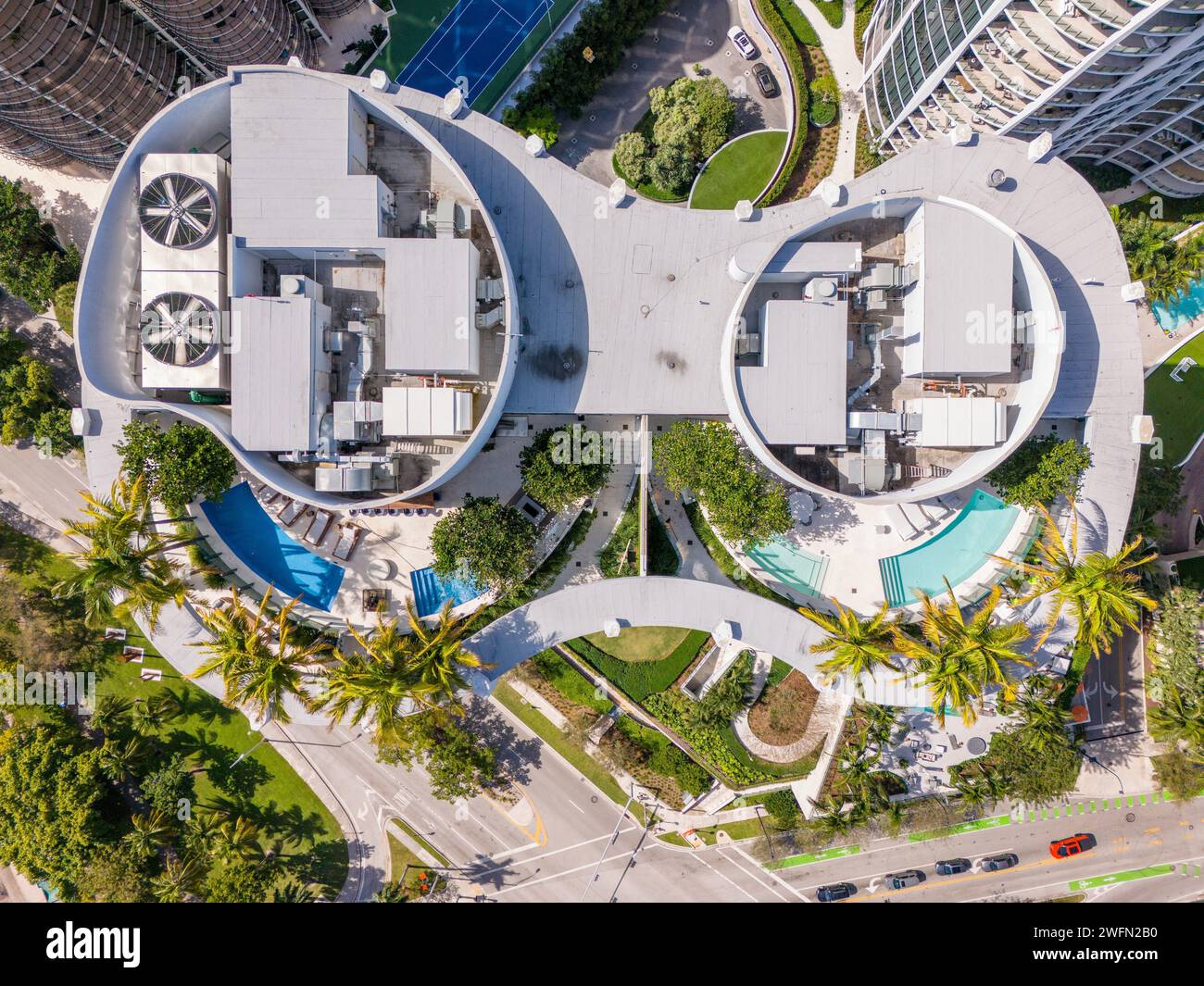 Aerial overhead photo of a building with rooftop swimming pool and ...