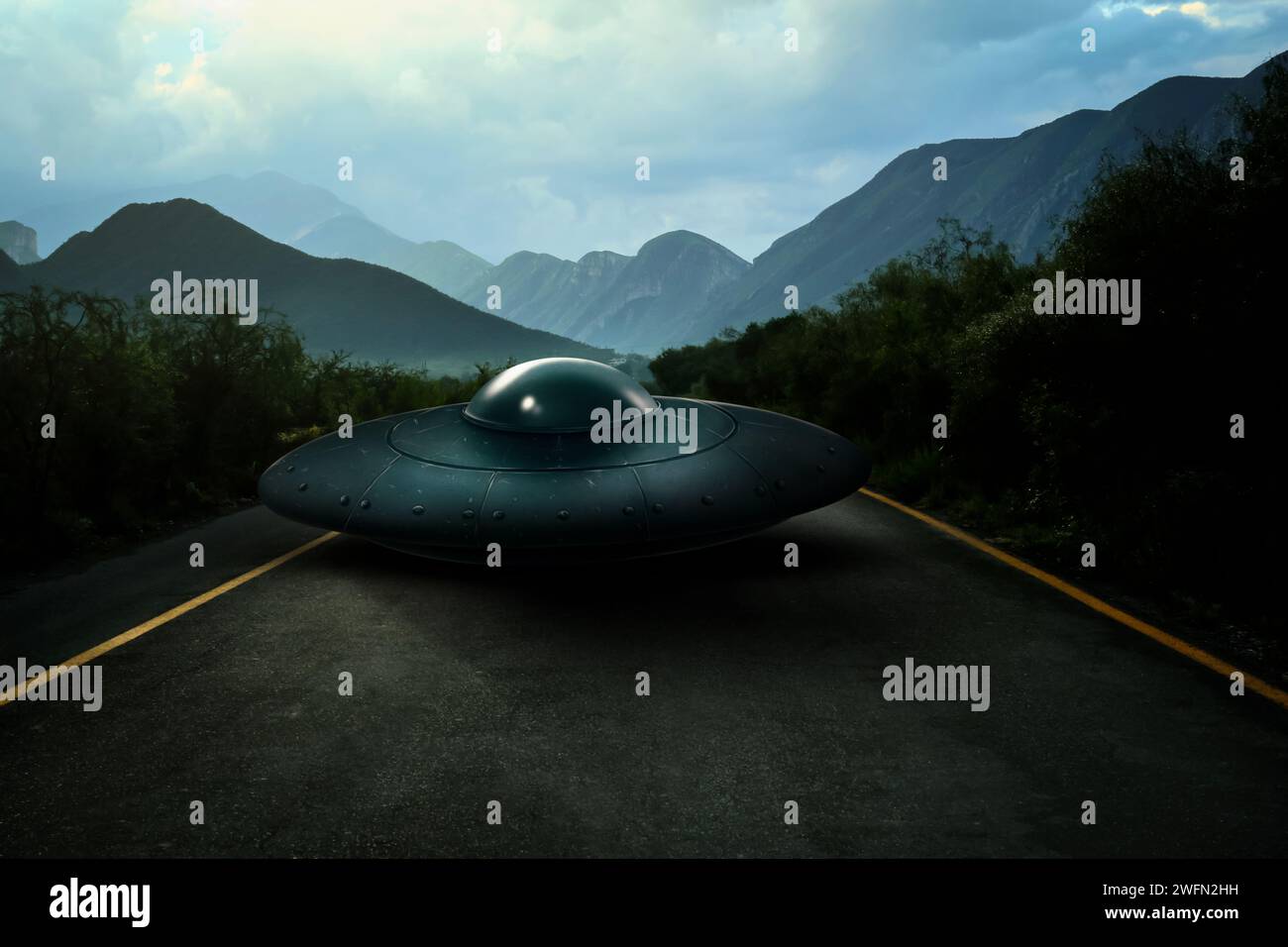UFO. Alien spaceship on asphalt highway outdoors. Extraterrestrial ...