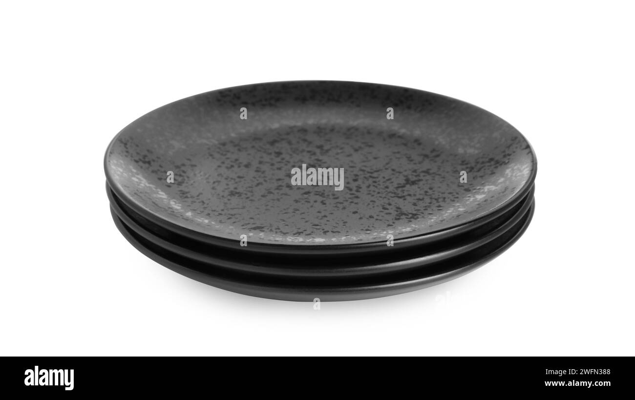 Three empty plates Black and White Stock Photos & Images - Alamy