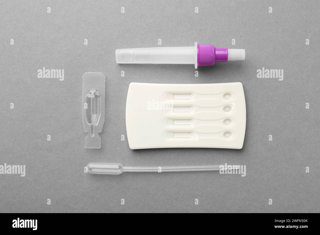 Disposable express test kit on grey background, flat lay Stock Photo ...