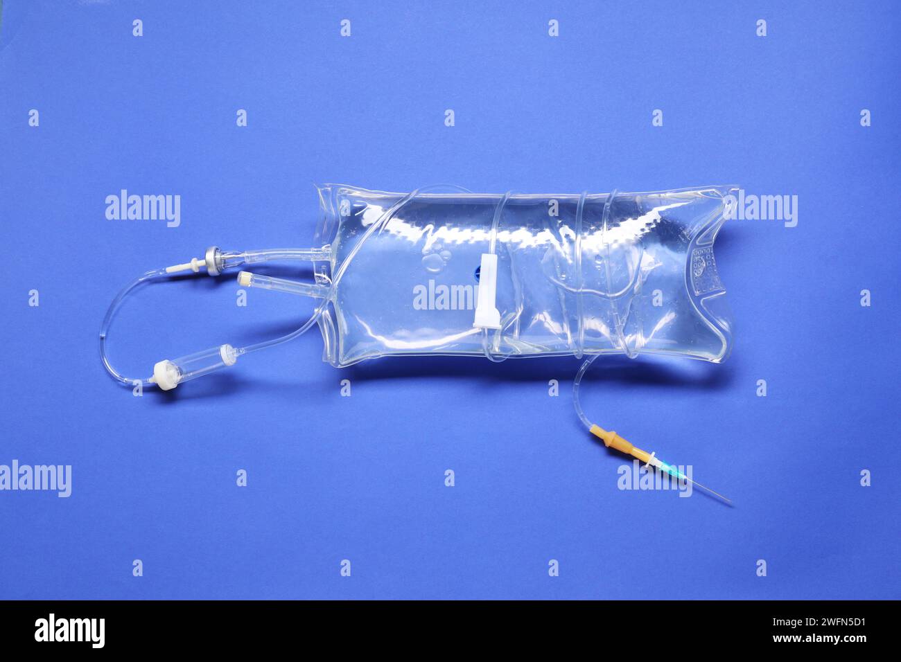 IV infusion set on blue background, top view Stock Photo - Alamy