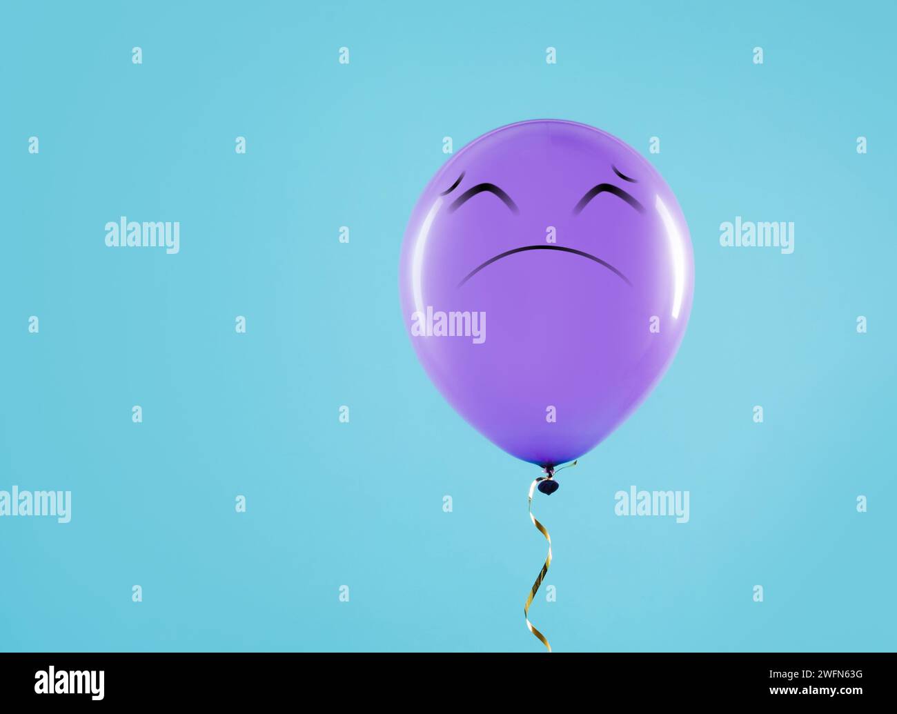 Purple balloon with sad face on light blue background. Space for text ...