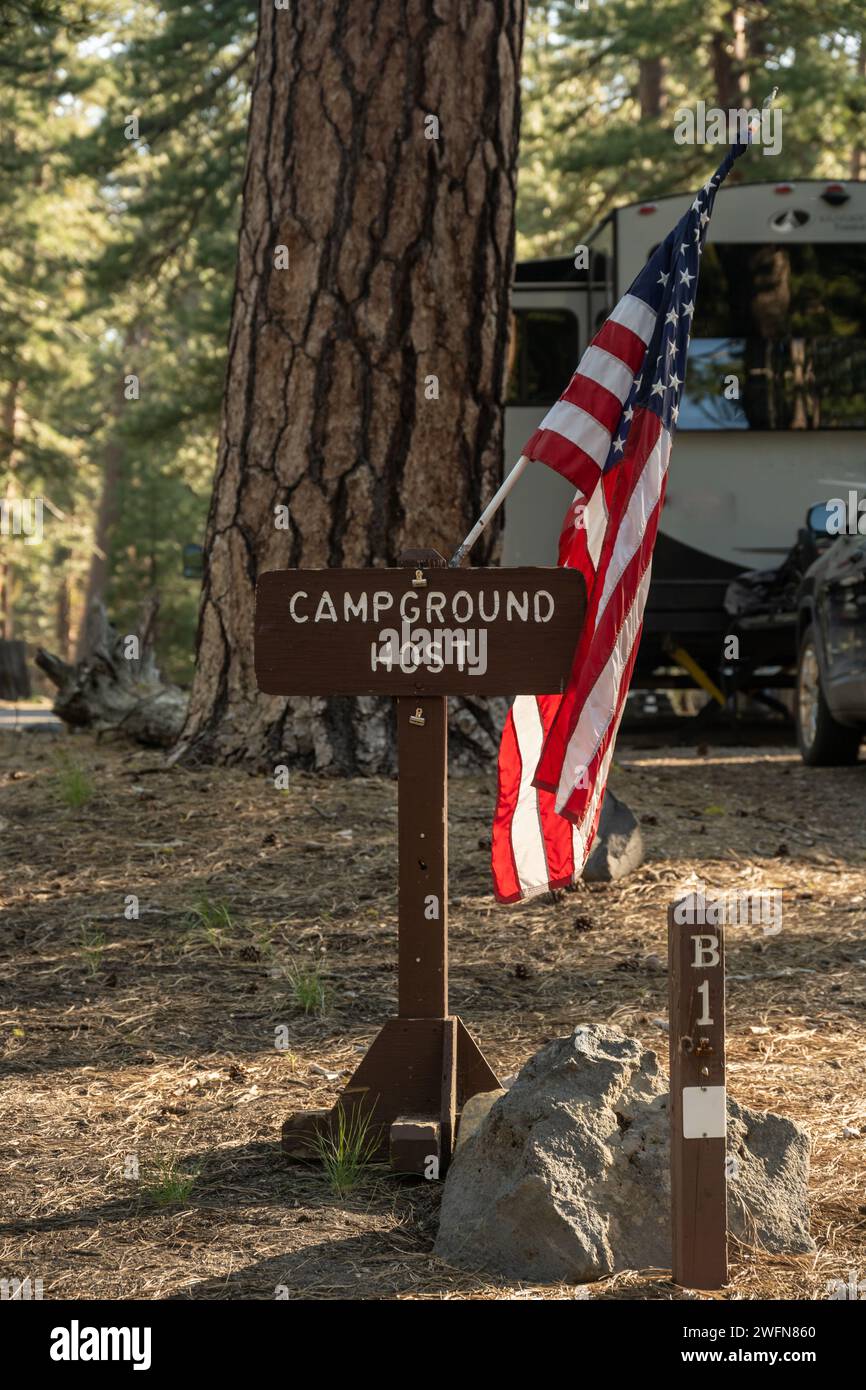 Campground Host Sign With American Flag Mounted On It in National Park ...