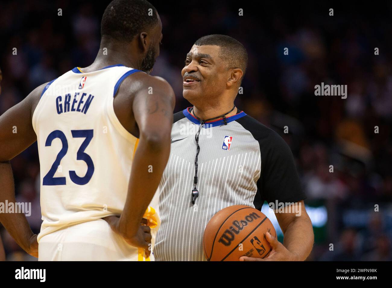 Golden State Warriors forward Draymond Green (23) and referee Tony ...