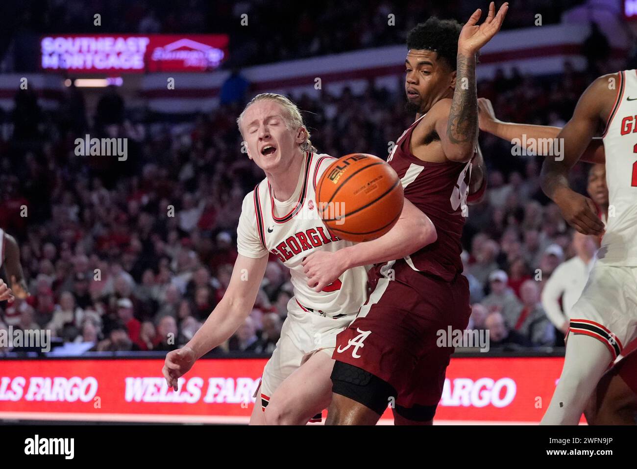 Georgia guard Blue Cain (0) loses control of the ball as he tries to ...