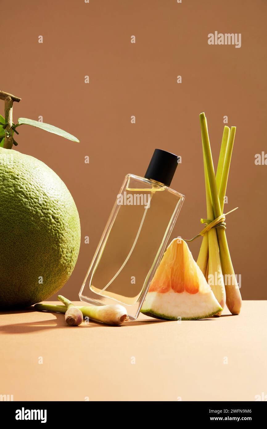 Front view of transparent empty label bottle of pink pomelo (Citrus ...