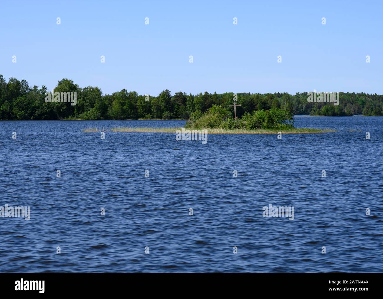 Wooden Christian cross on a small island on Lake Onega Stock Photo - Alamy