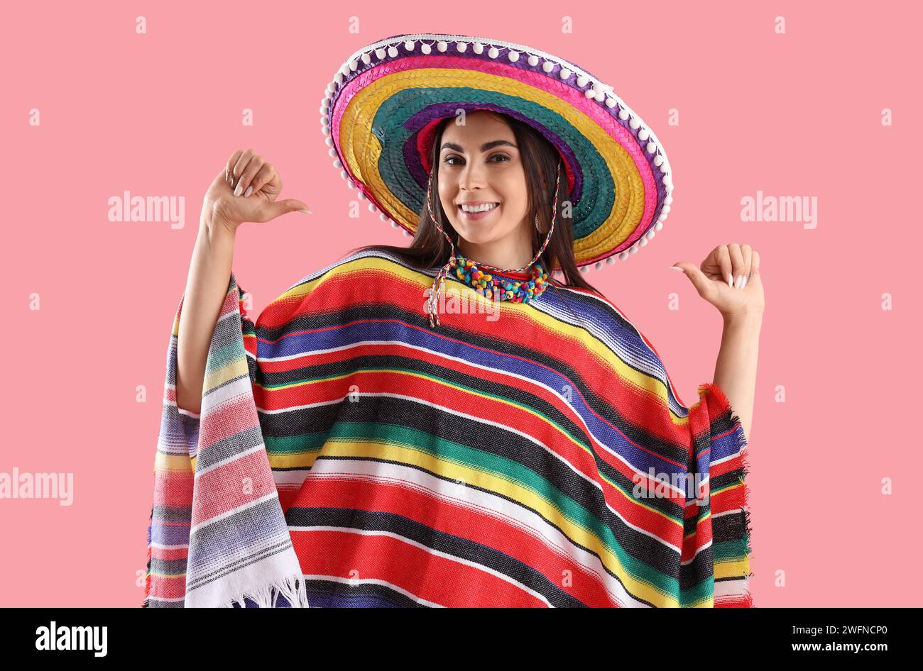 Beautiful woman in traditional Mexican clothes on pink background Stock ...
