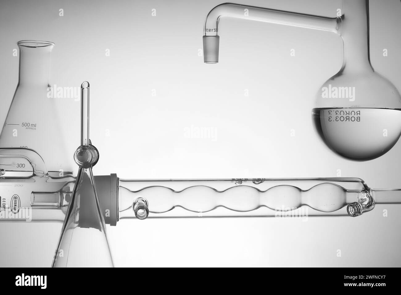 Back light concept with transparent laboratory glassware containing ...