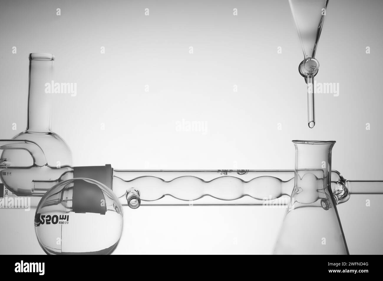 Front view of laboratory glassware on white background. Research and ...