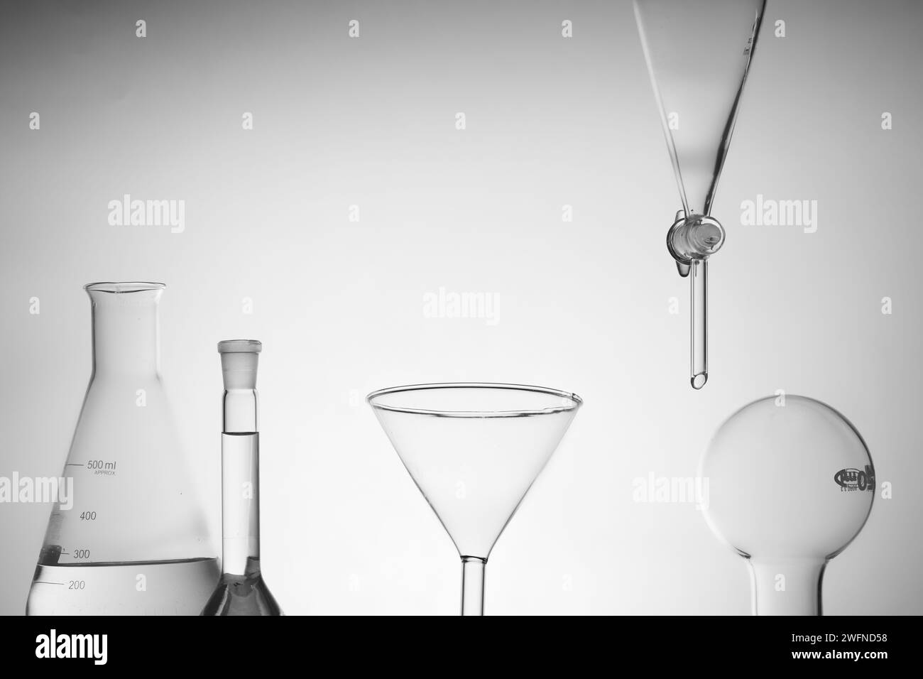 Assorted laboratory glassware equipment showcase on white background ...