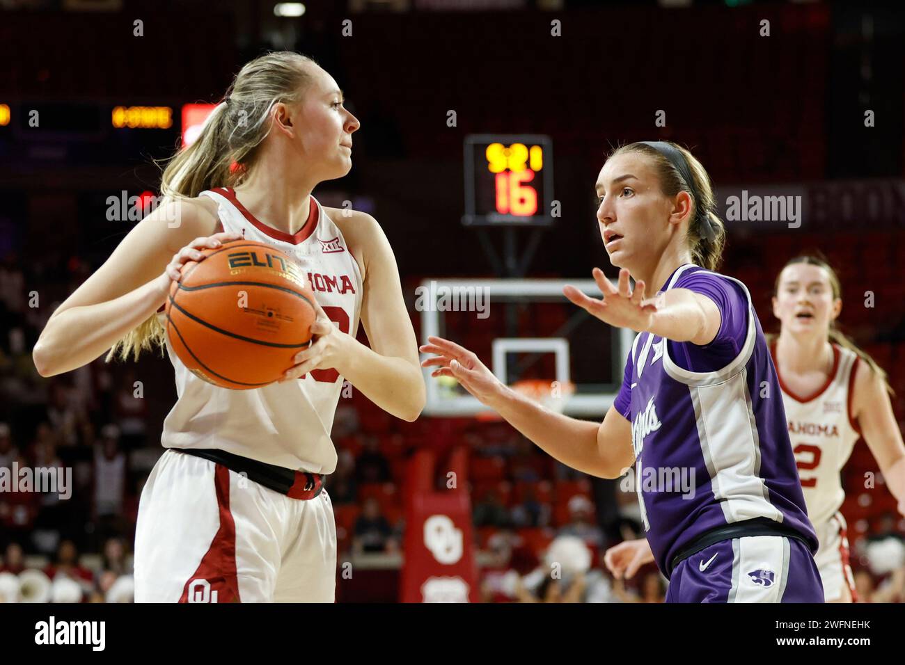 Oklahoma guard Aubrey Joens, left, goes against Kansas State guard ...