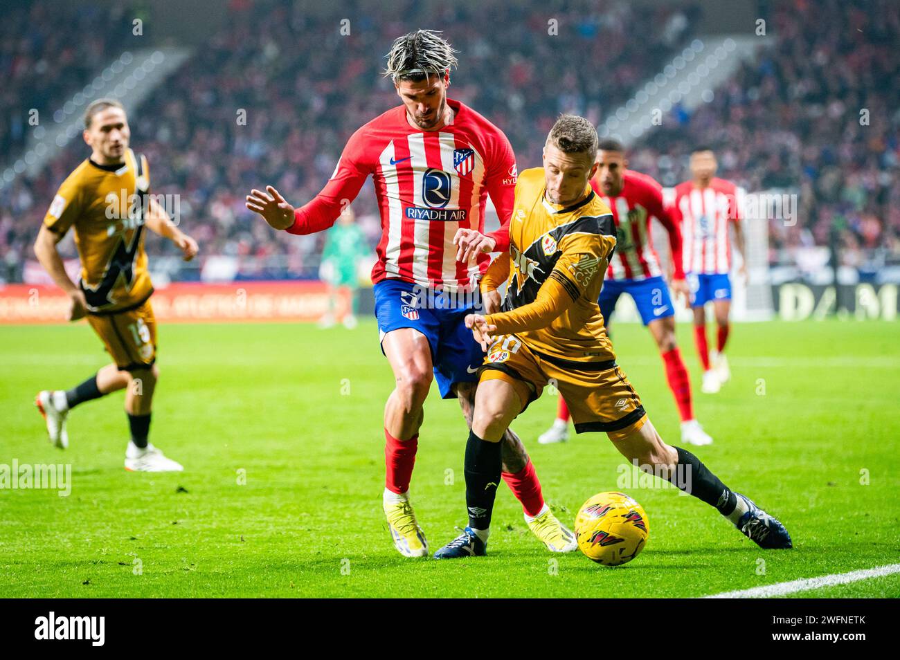 Madrid, Spain. 31st Jan, 2024. Rodrigo De Paul (L) of Atletico Madrid ...