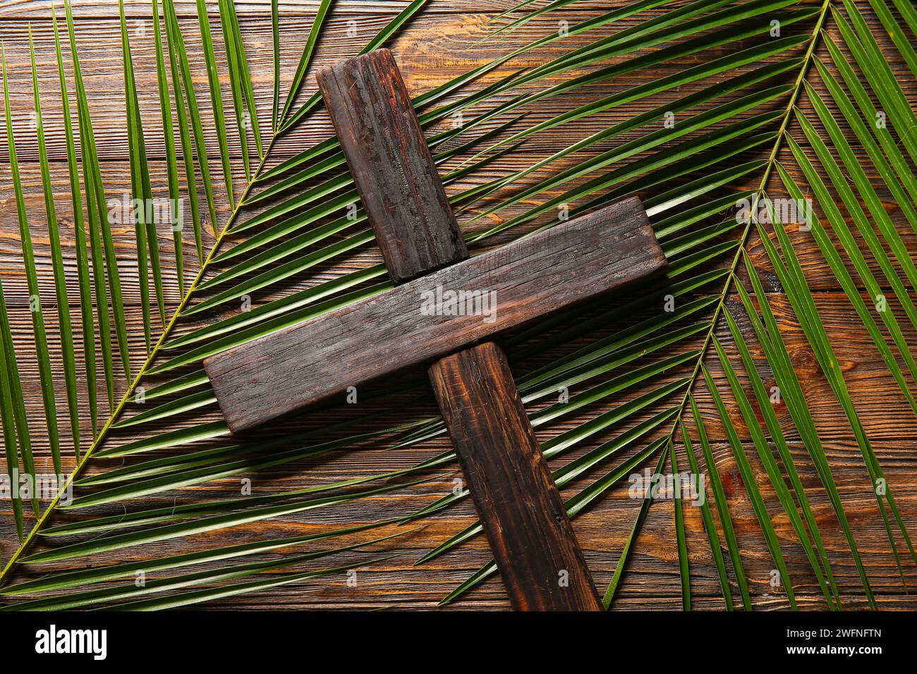 Wooden cross palm leaves hi-res stock photography and images - Alamy
