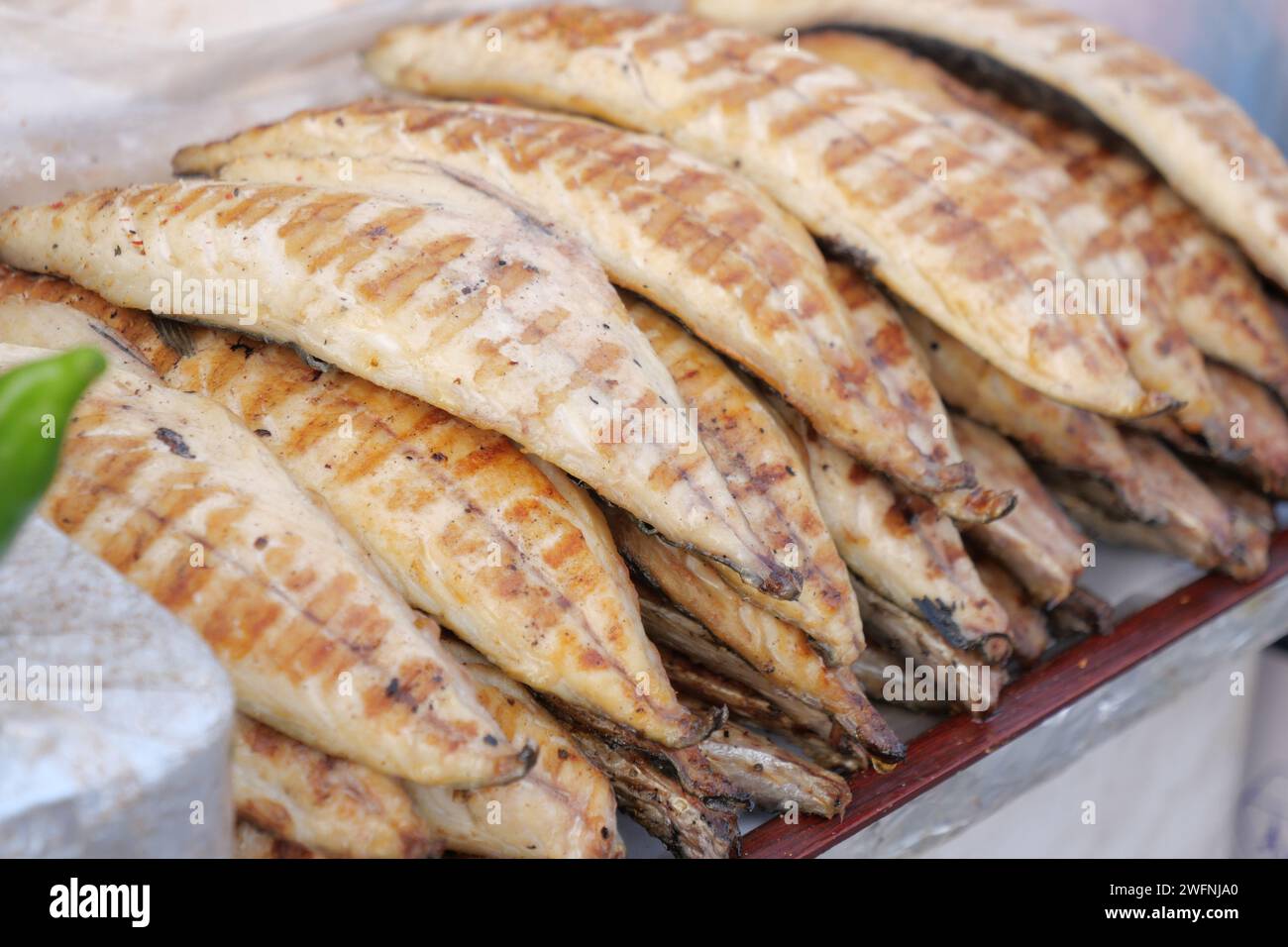 Baking and roasting fish on barbecue grill Stock Photo - Alamy