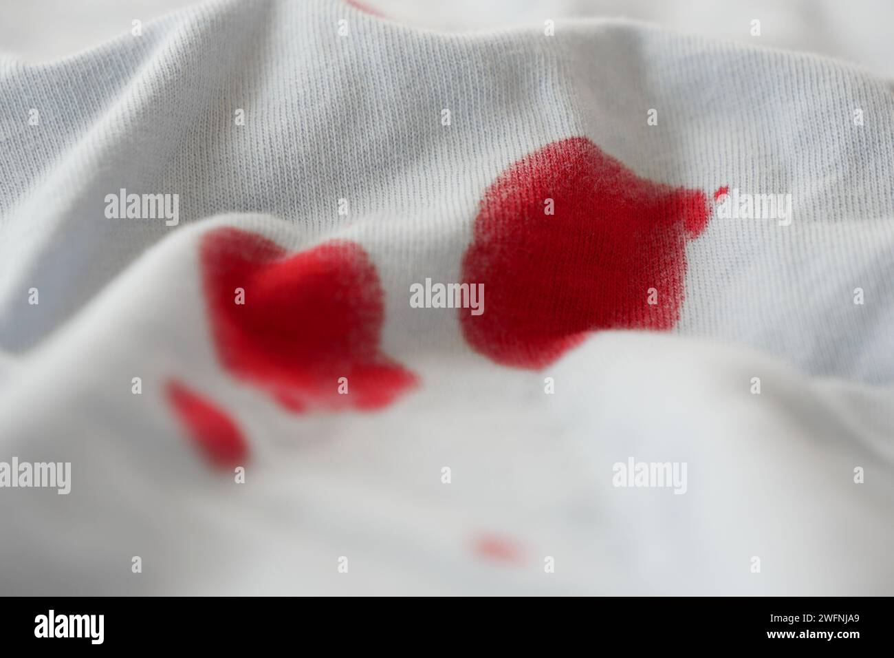 blood stains on a white shirt Stock Photo - Alamy